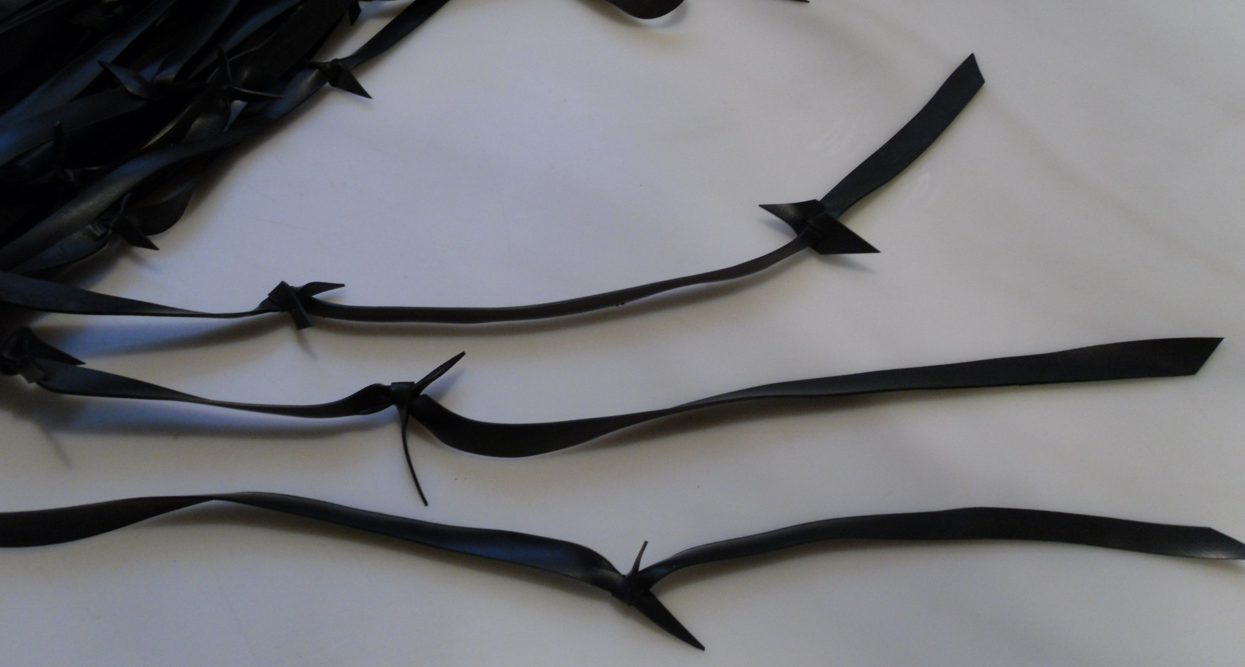 Rubber Barbed Wire Flogger – Kinky Elf Toys